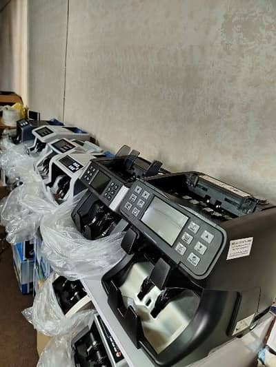 cash counting machines Multi currency note counting with sorting ...