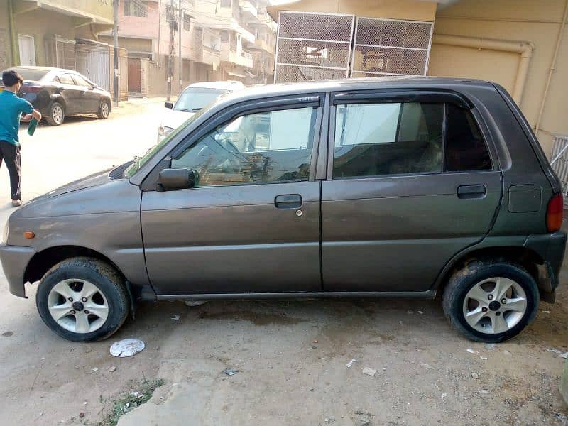 Daihatsu Cuore 2006 - Cars - 1100800405
