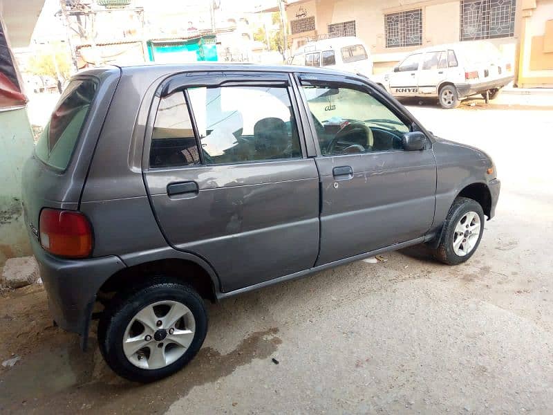 Daihatsu Cuore 2006 - Cars - 1100800405