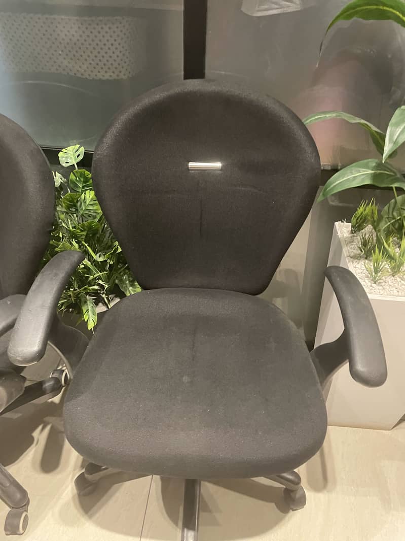 Revolving office chairs - Chairs - 1101910941