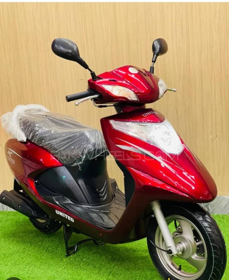 united 100cc scooty petrol red colour new condition 10/10 - Petrol ...