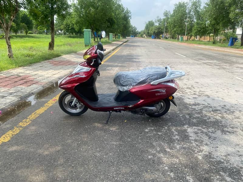United Scooty US 100 | Model 2023 | Excellent Condition | Fuel Scooter ...