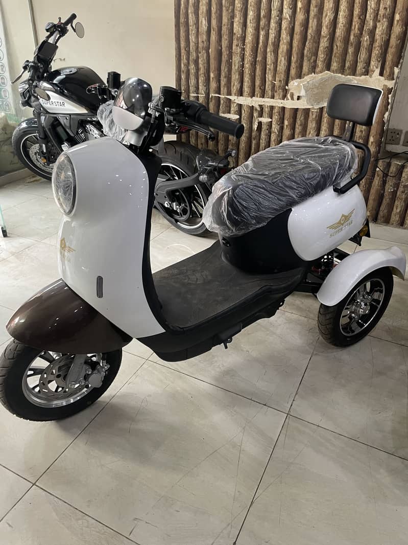 Tri Star Electric Scooty – Graphene Battery | Safe & Comfortable Ride ...