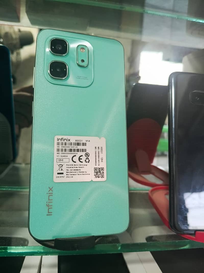 Infinix Hot 50i / Green color - Mobile Phones - 1106576978