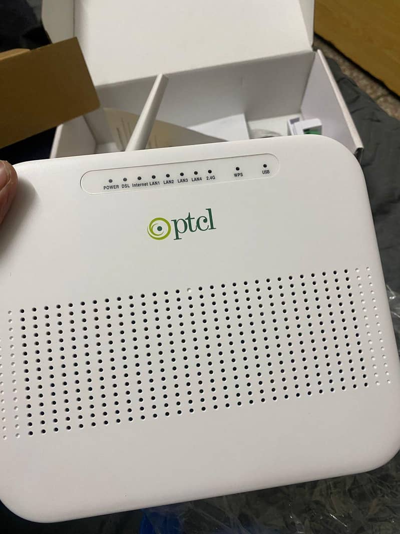 ptcl modem with charger and cable new hai bilkul not used - Networking ...