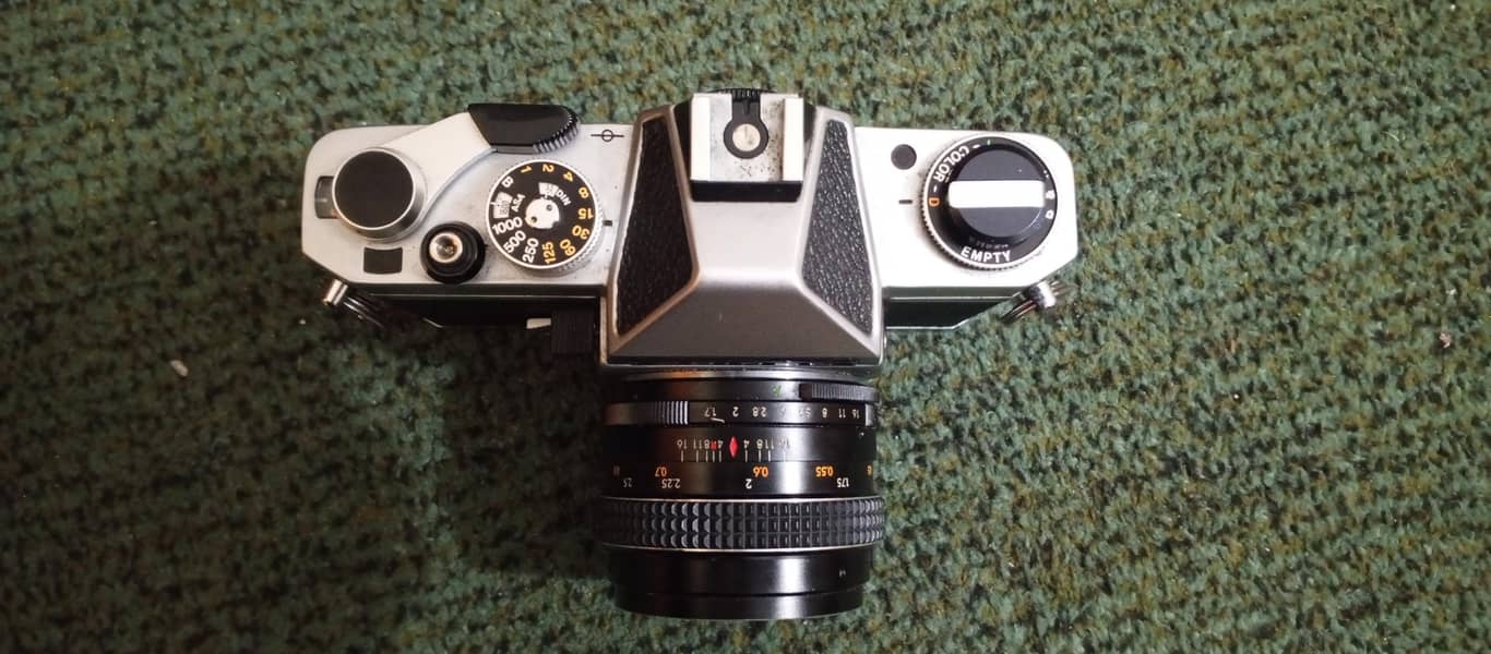 Chinon CS 35mm SLR film camera with a 55mm f/1.7 Auto Chinon lens ...
