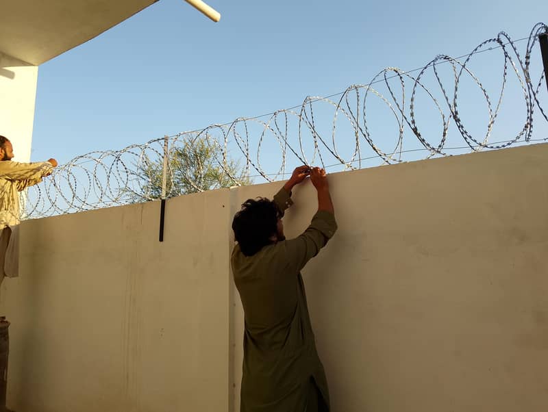 Security Home with Razor Blade Wire Concertina Barbed Chainlink Mesh ...
