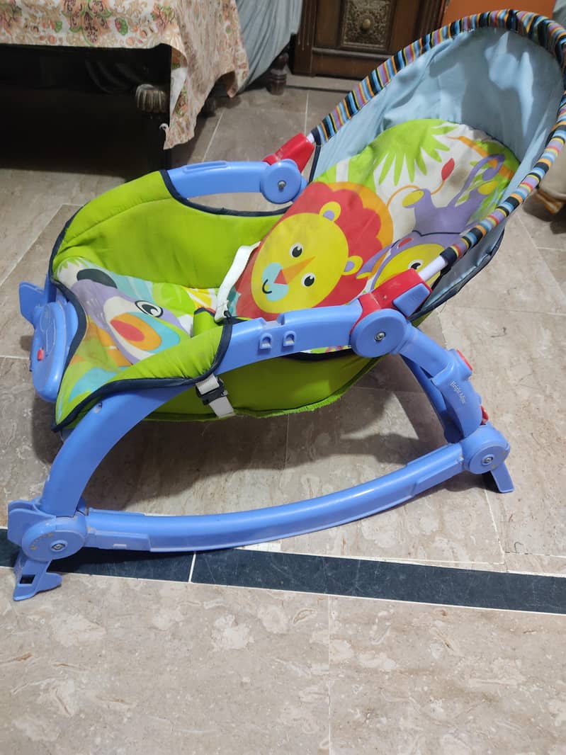 Newborn to Toddler Portable Rocker and Bouncer and hanging toys ...