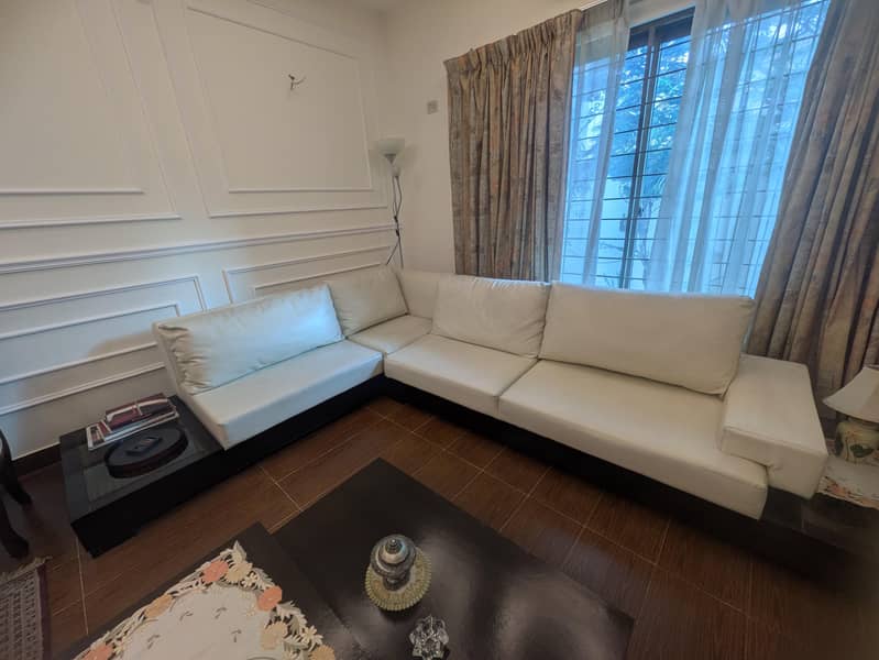 White Leather L Shape Sofa with Glass Top Attached Side Table - Sofas ...