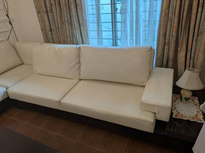 White Leather L Shape Sofa with Glass Top Attached Side Table - Sofas ...