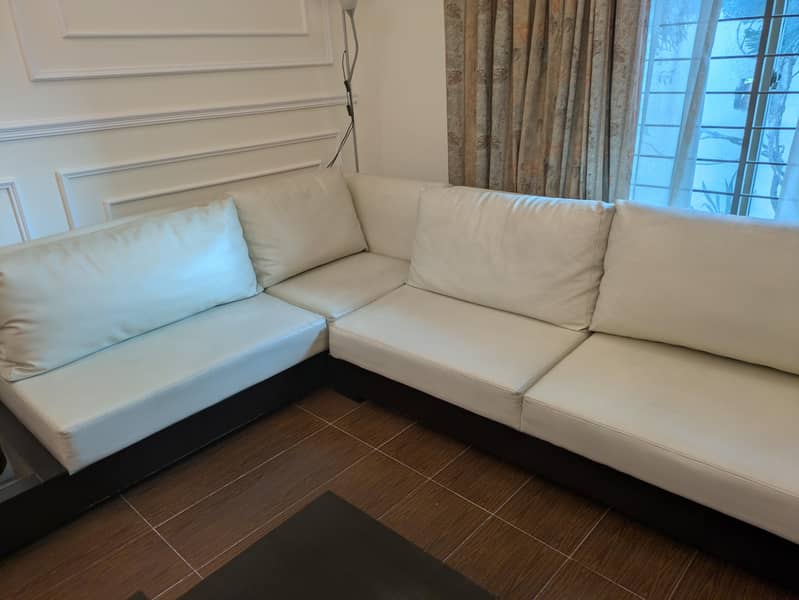 White Leather L Shape Sofa with Glass Top Attached Side Table - Sofas ...