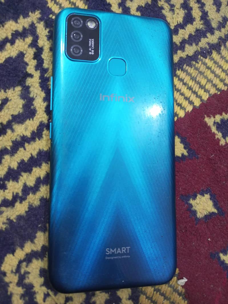 Infinix smart 5 official pta approved with box + charger & back cover ...