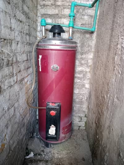 A less used condition geyser in red colour and with gas power source ...