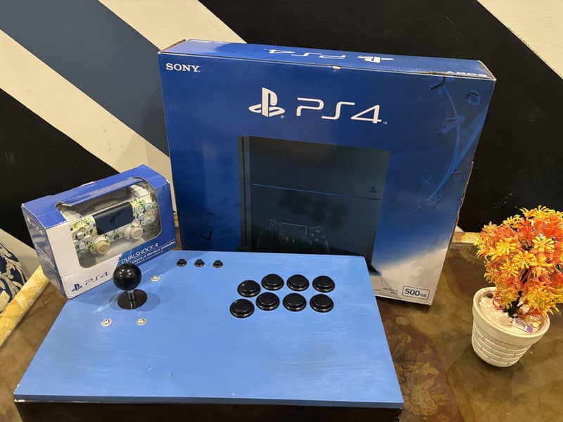 PS4 jailbreak 500 GB with original box. And custom arcade stick ...