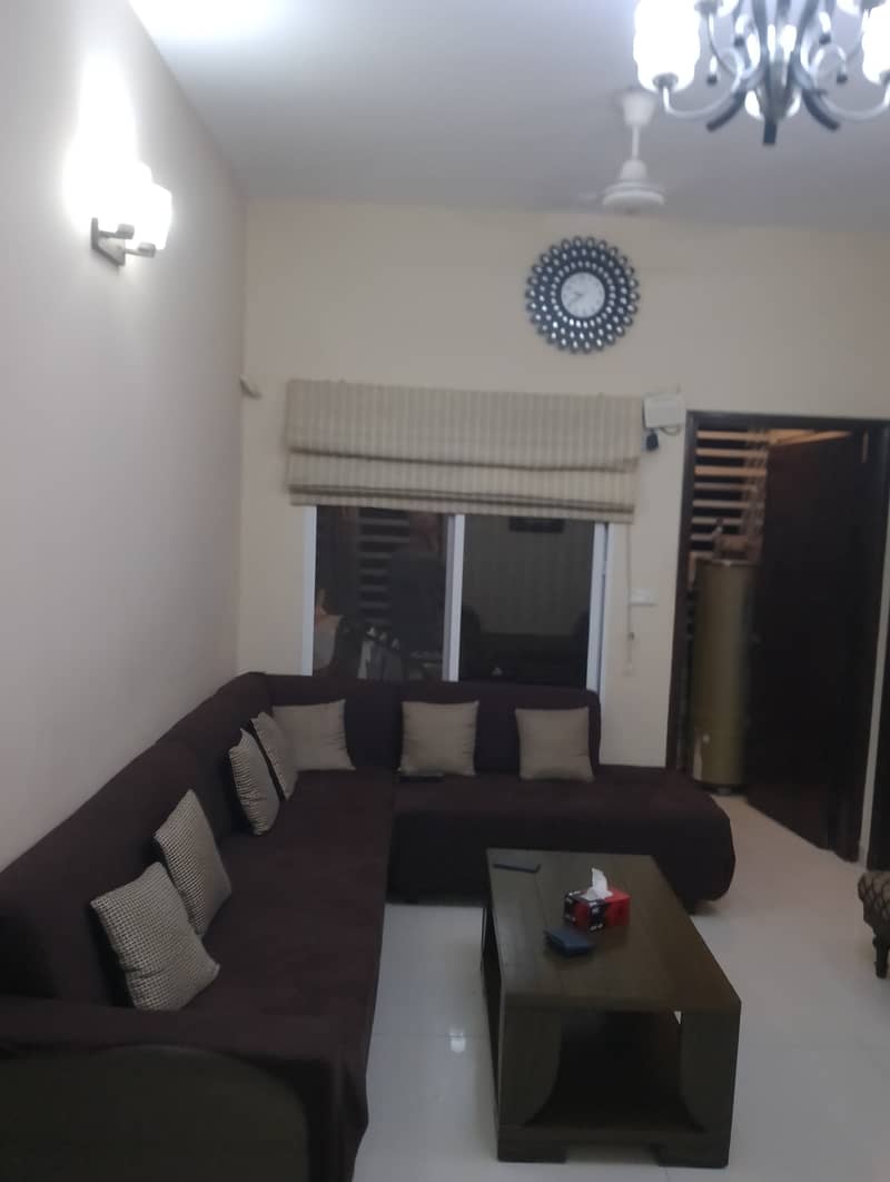 A spacious and well-maintained apartment for sale in PECHS Block 2 ...
