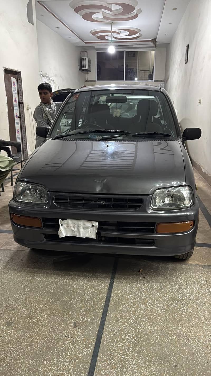 Daihatsu Cuore 2010 - Cars - 1115651431